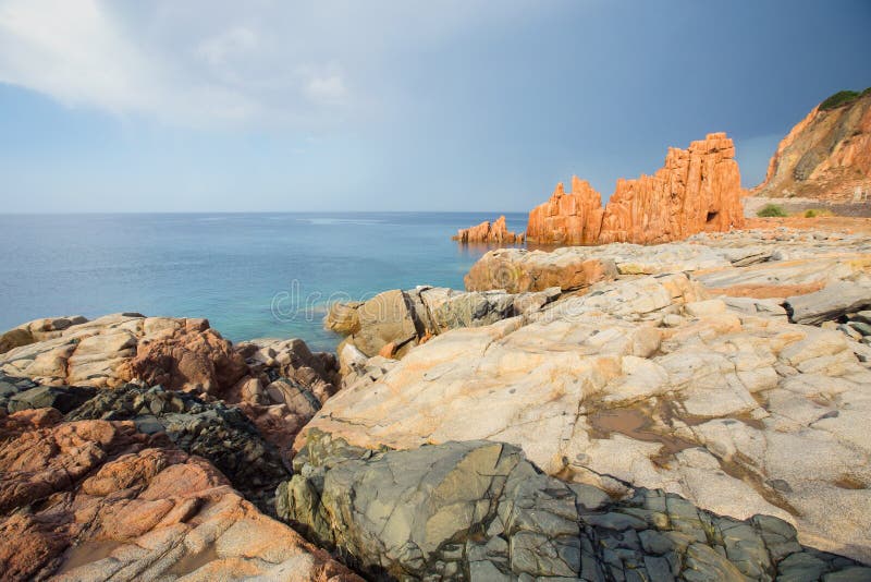 Rocce Rosse Arbatax, Sardinia, Italy Stock Photo - Image of orange ...