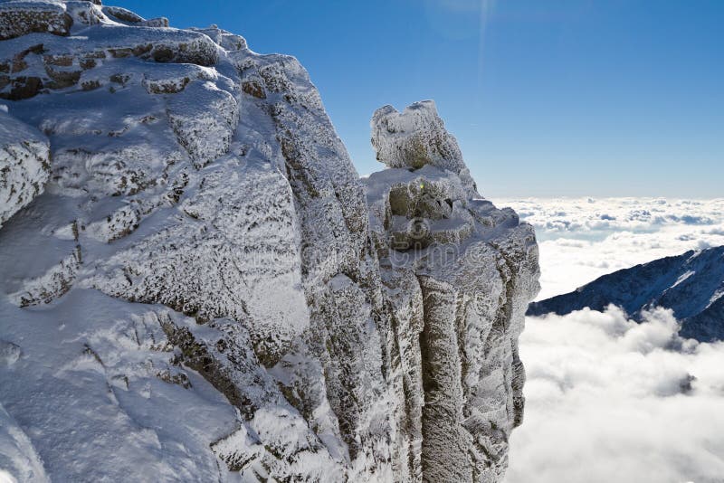 Rock above the clouds stock photo. Image of skies, blue - 18903208