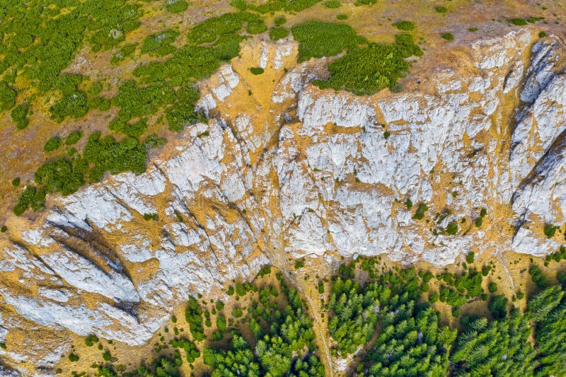 Rock above green forest stock photo. Image of europe - 133917514