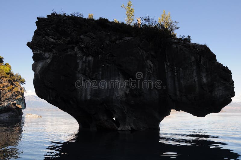 Rock above the lake. stock image. Image of wall, lake - 31659865