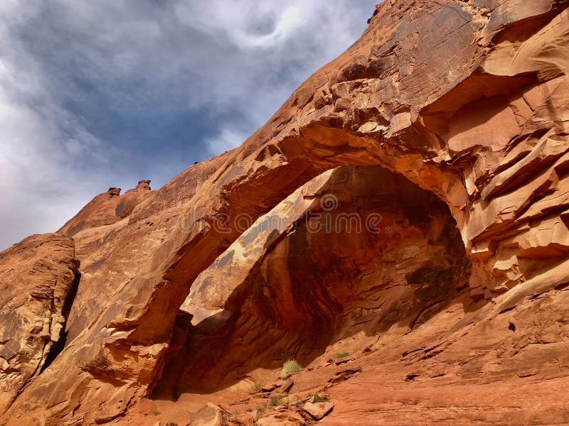 Rock Arch Near Moab Utah in Hidden Canyon. Stock Photo - Image of brush ...