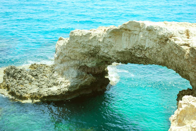 Rock arch with sea water stock image. Image of summer - 20345749