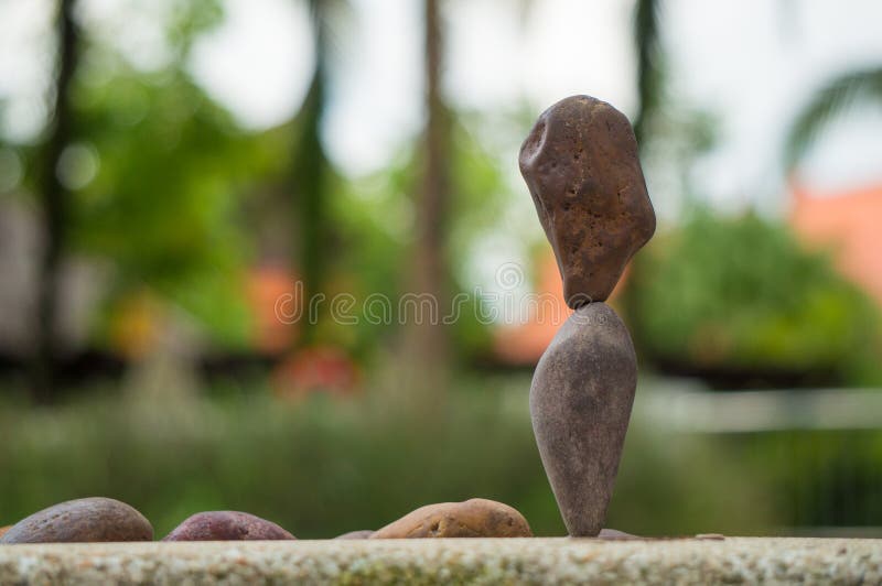Rock Balancing on the Edge of Iconic Cliffs of Moher, Ireland Stock ...