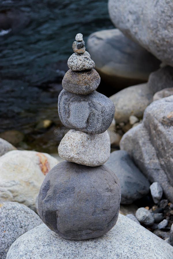 Rock Balancing Having Flowing River in the Background Stock Image ...
