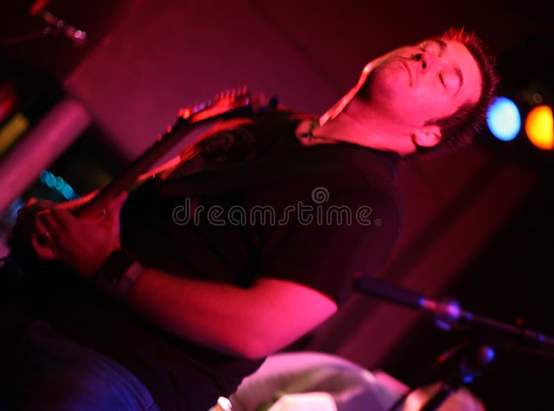 Band Member Playing Guitar Solo on Stage, Close-up Stock Photo - Image ...
