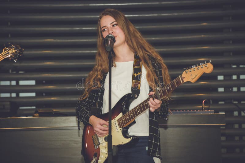 Rock band on a scene. editorial photo. Image of classical - 104494586