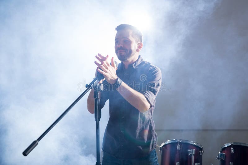 Rock Singer Performing on Stage Stock Image - Image of roll, live ...