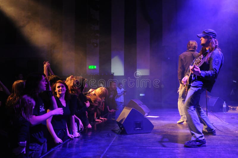 Rock band on stage editorial photo. Image of musical - 18079391