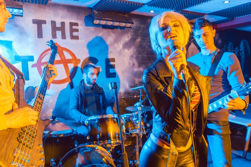 Rock Band on Stage after Successful Concert Stock Photo - Image of ...