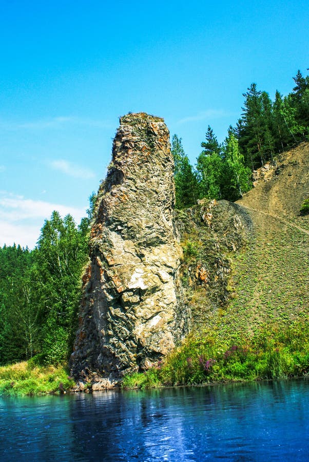 A rock on the Bank. stock photo. Image of blue, scenic - 75044794