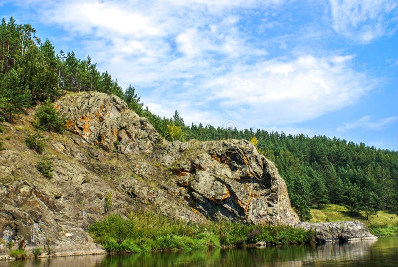 A rock on the Bank. stock image. Image of mountains, spring - 75044845