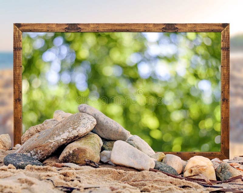Rock on the Beach with Beautiful Forest Bokeh Picture Frame and Stock ...