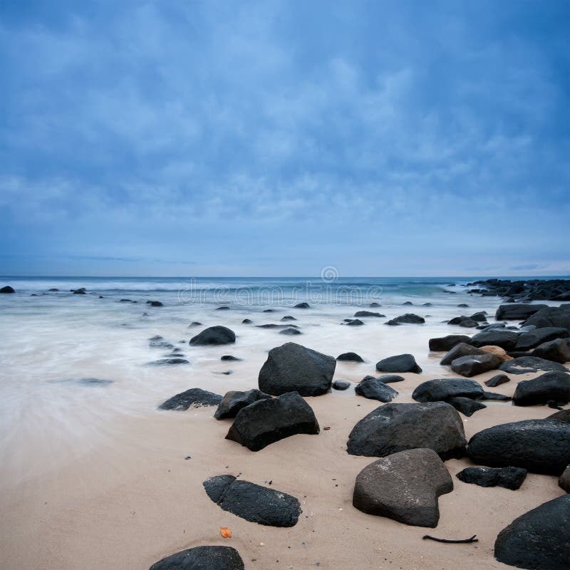 Rock on the Beach with Dramatic Sky on Square Form Stock Photo - Image ...
