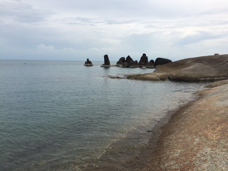 Rock beach stock image. Image of rock, ocean, beach - 112657741