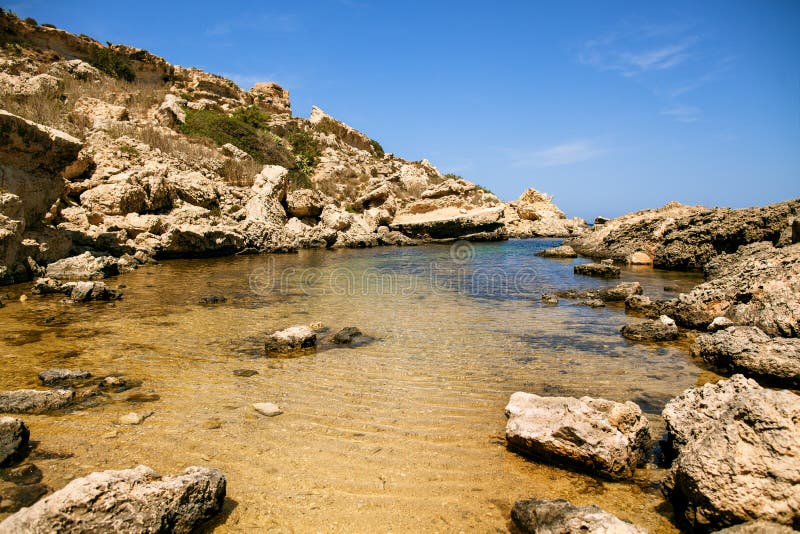 Rock beach stock photo. Image of beach, holiday, ocean - 84903136