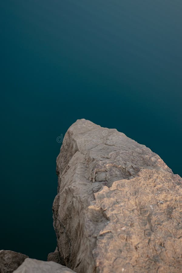 Rock with blue water stock image. Image of monument - 217452595