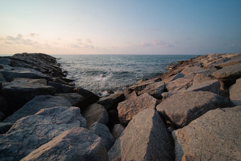 Rock Breakwater in the Sea in the Morning Stock Photo - Image of coast ...