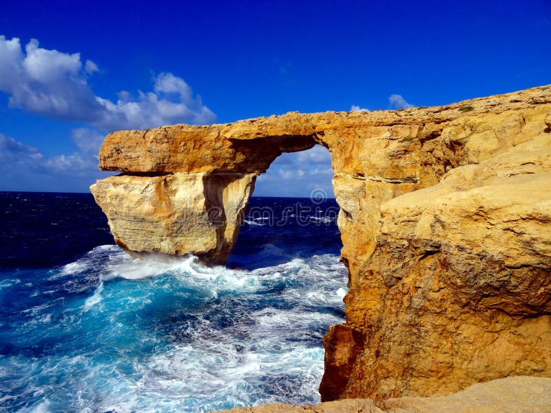 Rock bridge on the sea stock image. Image of cliffs, water - 86550527