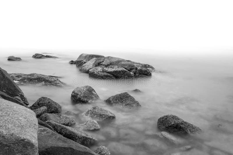 Rock and Calm Sea stock photo. Image of stone, seascape - 90664954