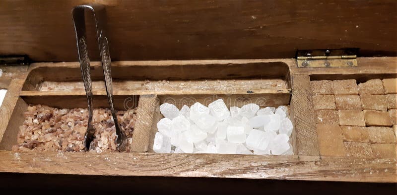 A Group of Rock Sugar. Brown Sugar Cubes in Wooden Box . Various Tea ...