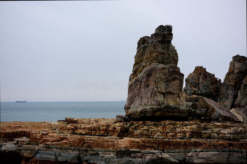 Rock cape stock photo. Image of horizon, boat, cape, mountain - 56733332