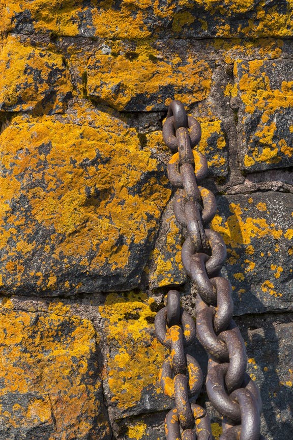 Rock & Chains stock photo. Image of harbor, iron - 34151572