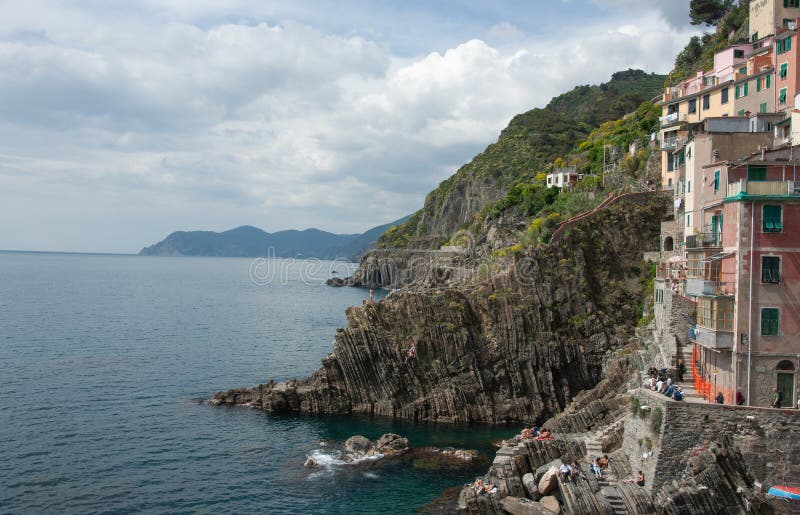 Rock Cliff Sea Edge with Rugged Weathered Vertical Pattern Plunging ...
