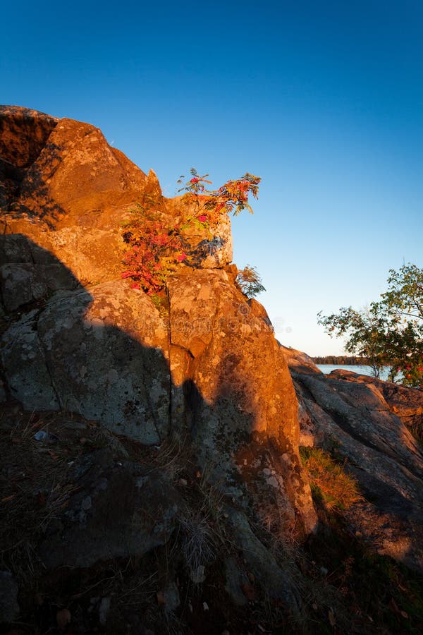 Rock cliff in sunset light stock photo. Image of clear - 144684150