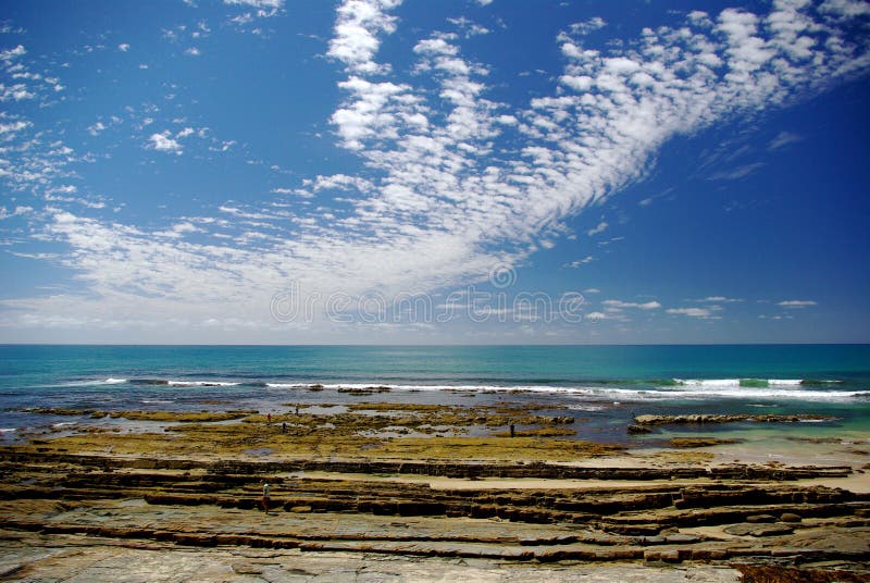 Rock Cliffs in the Ocean stock image. Image of tide, shore - 14635033