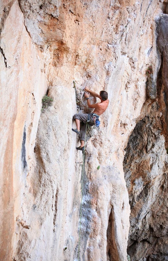 Rock Climber Falling of a Cliff while Lead Climbing. Stock Image ...