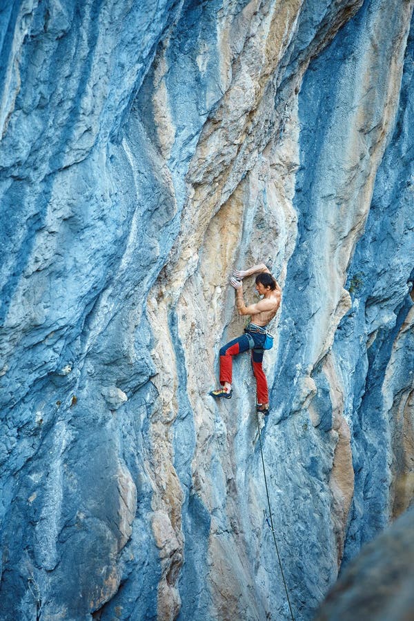 Rock Climber Climbing Up a Cliff Stock Image - Image of extreme ...