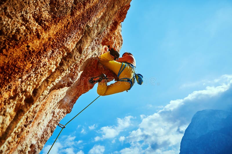 Rock Climber Climbing Up a Cliff Stock Image - Image of height ...
