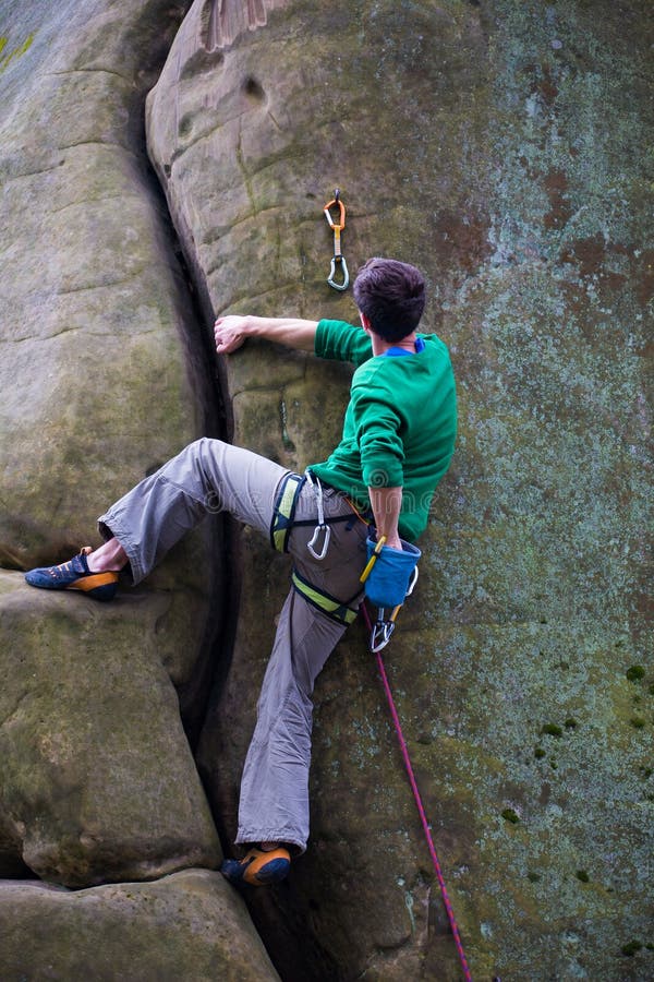 A Rock Climber Climbs Up the Mountain. Stock Image - Image of evening ...