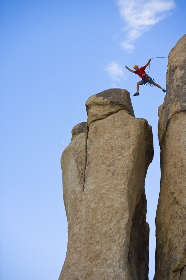 Rock climber rappelling. stock image. Image of heights - 6202743