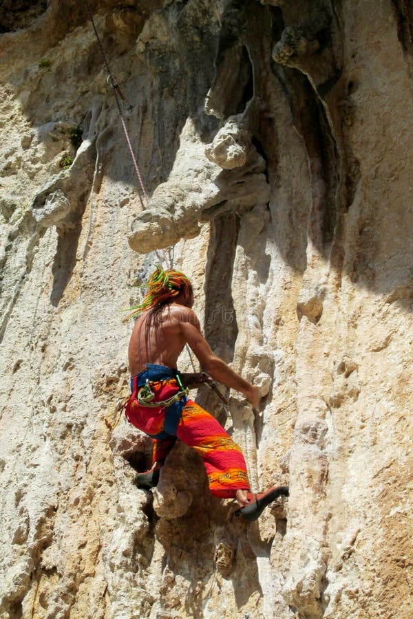 Rock climber with a rope stock photo. Image of danger - 93047700
