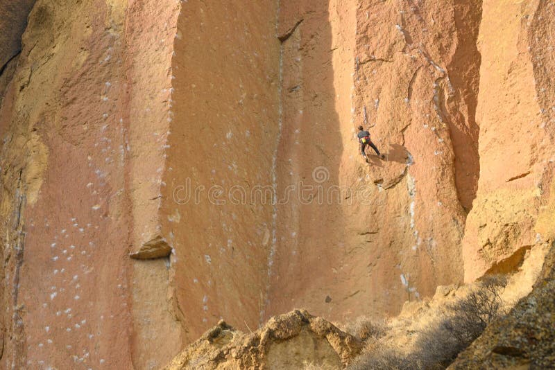 Rock Climbers Climb a Large Rock, Filmed from the Back Stock Image ...