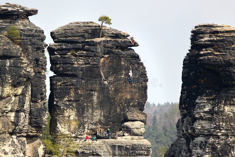 Rock Climbers on Sandstone Tower in Saxon Switzerland, Germany Stock ...