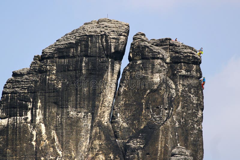 Rock Climbers on Sandstone Tower in Saxon Switzerland, Germany Stock ...