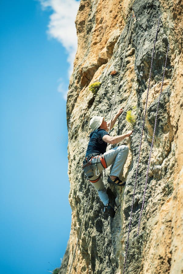 Rock climbing. stock image. Image of climbing, mountain - 91441411