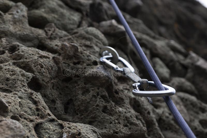 Rock Climbing Safety Equipment, Dynamic Rope and Carabiner Fixed on ...