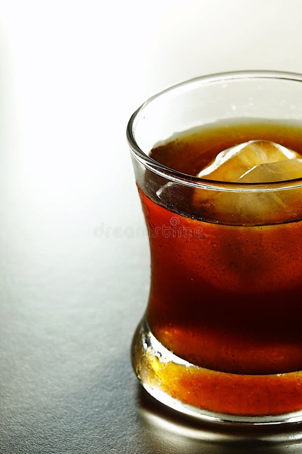 On the Rock Cold Brew Iced Coffee in a Clear Glass Cup on a Granite ...