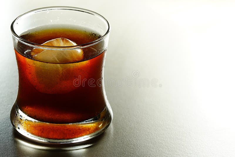 On the Rock Cold Brew Iced Coffee in a Clear Glass Cup on a Granite ...