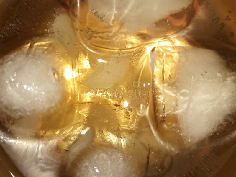 Ices Rocks in a Beer Like Beverage Stock Photo - Image of condensation ...