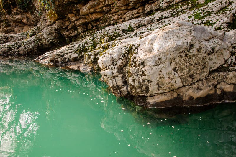 Rock Covered with Moss on the Green Mountain River Bank Stock Photo ... Rock Covered with Moss on the Green Mountain River Bank Stock Photo ...