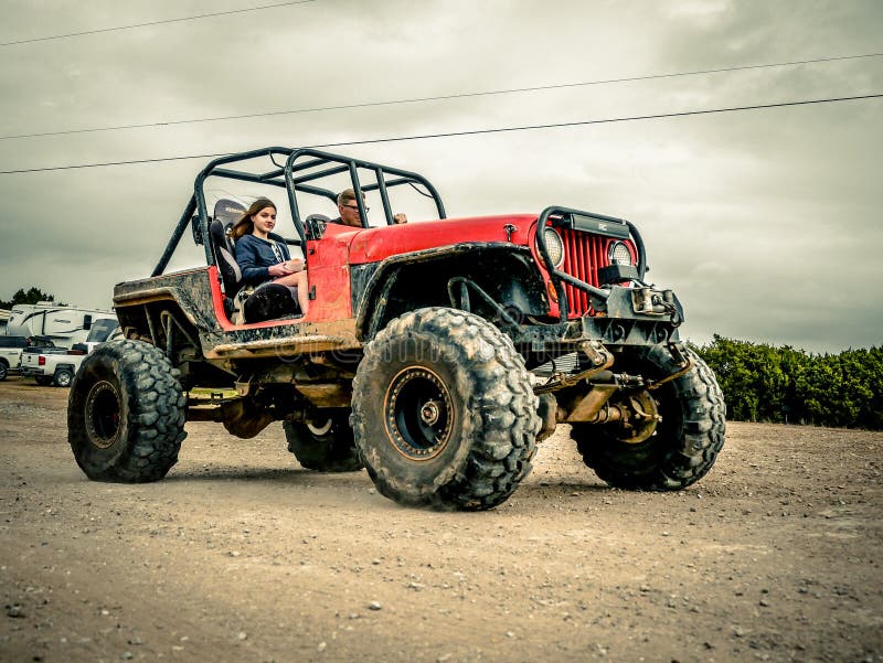 Orange Jeep Rock Crawling editorial photography. Image of comanche ...