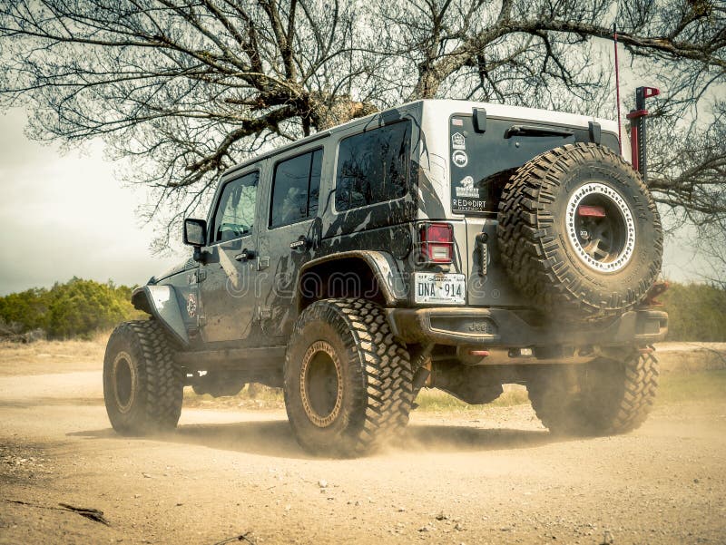 Orange Jeep Rock Crawling editorial stock image. Image of compass ...