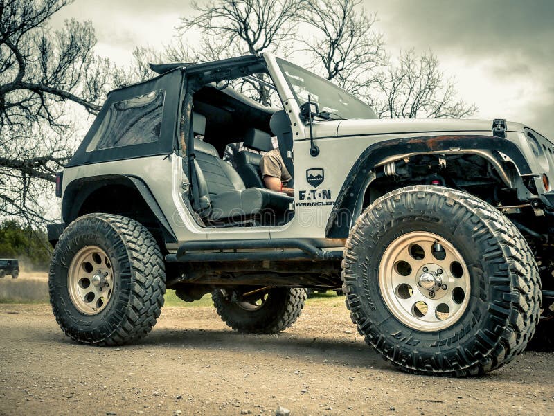Orange Jeep Rock Crawling editorial stock photo. Image of commander ...