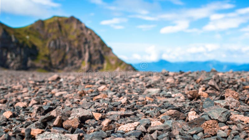 Rock in the Distance and a Mound of Rubble in the Foreground, a ...