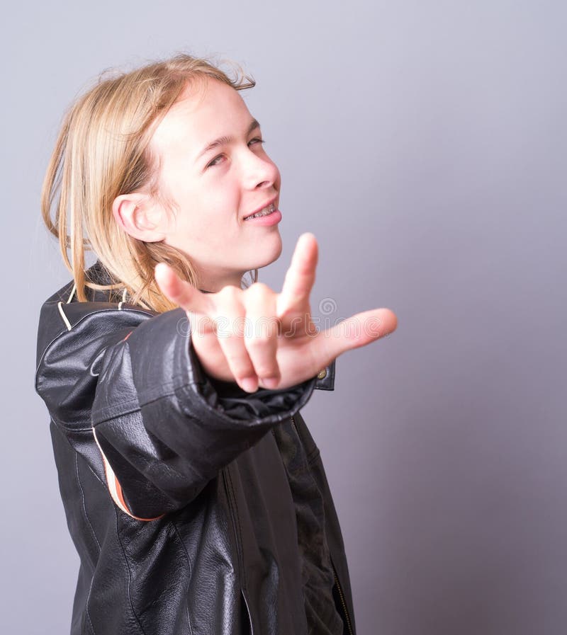 Rock on Dude - Teenage Rocker Stock Image - Image of eating, teen: 25663201