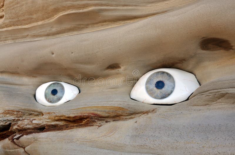 Rock with eyes stock photo. Image of rock, mountains - 13894422